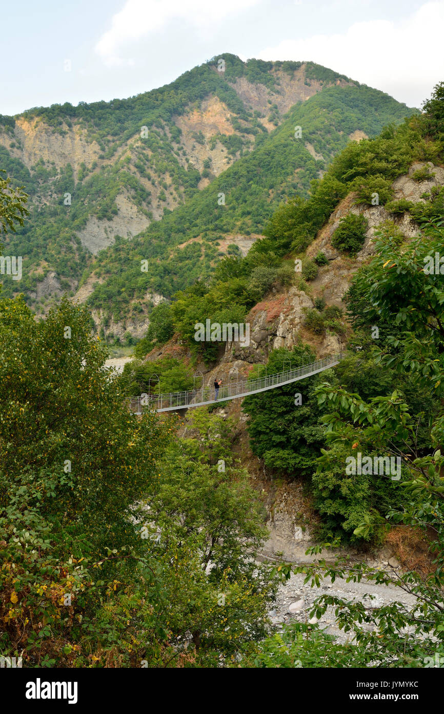 Zarnava suspension footbridge across Girdimancay river near Lahic Stock ...