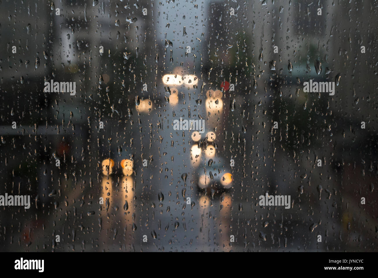 Rainy city street hi-res stock photography and images - Alamy