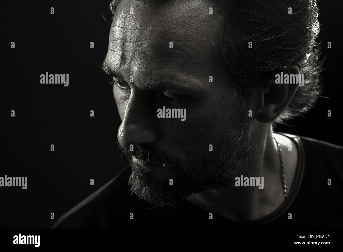 Male face looking left hi-res stock photography and images - Alamy