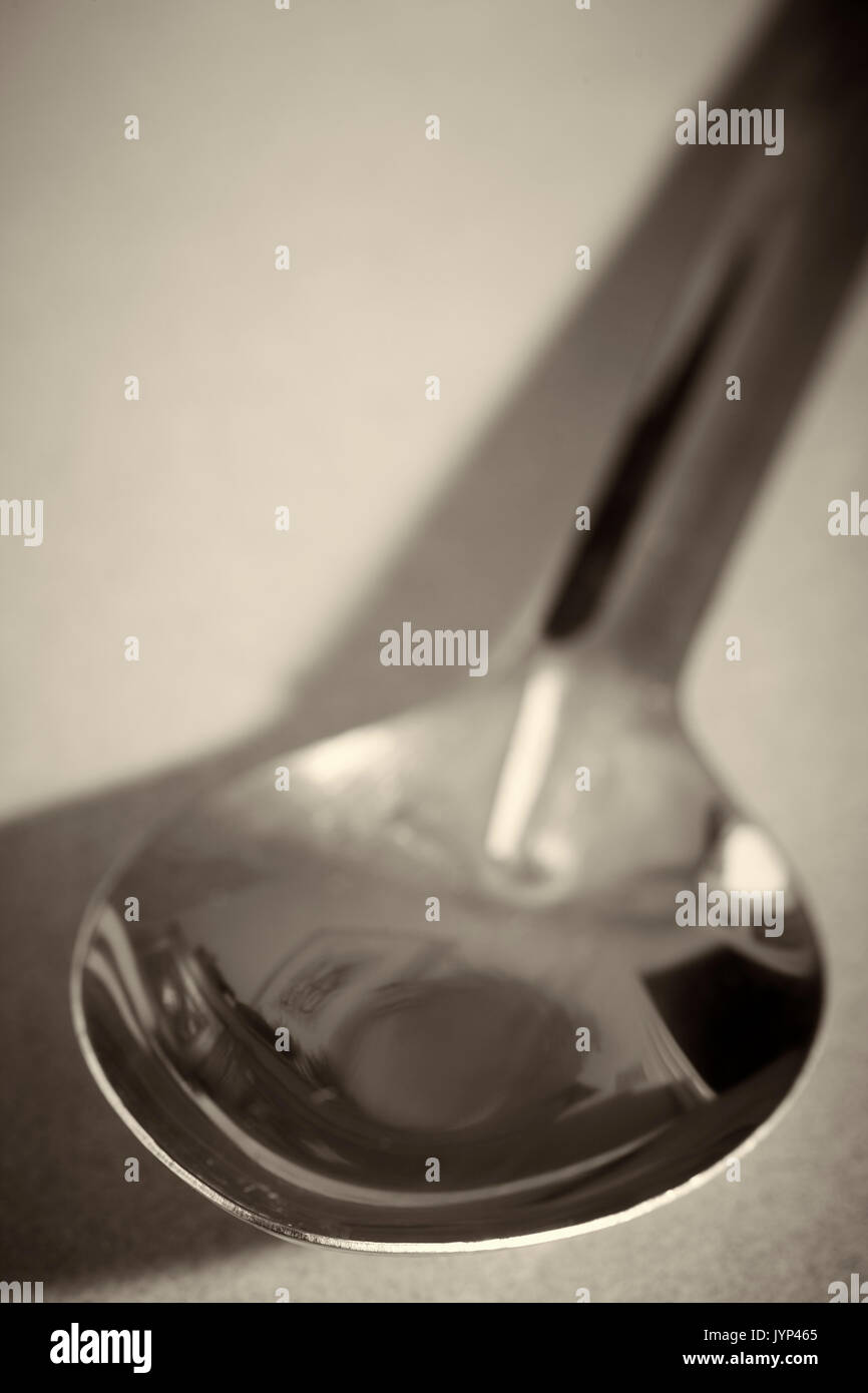 steel kitchen spoon Stock Photo - Alamy