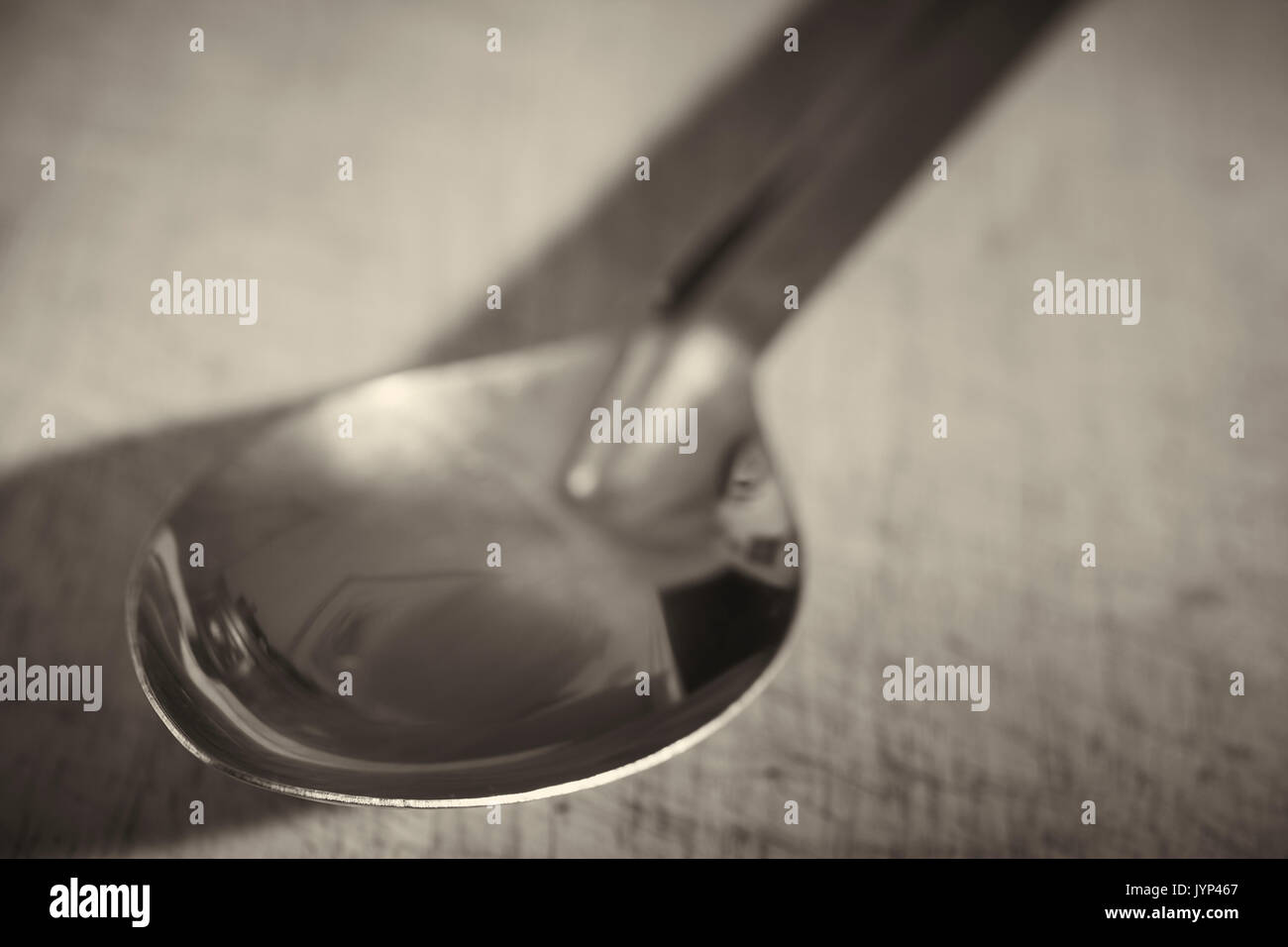 steel kitchen spoon Stock Photo - Alamy
