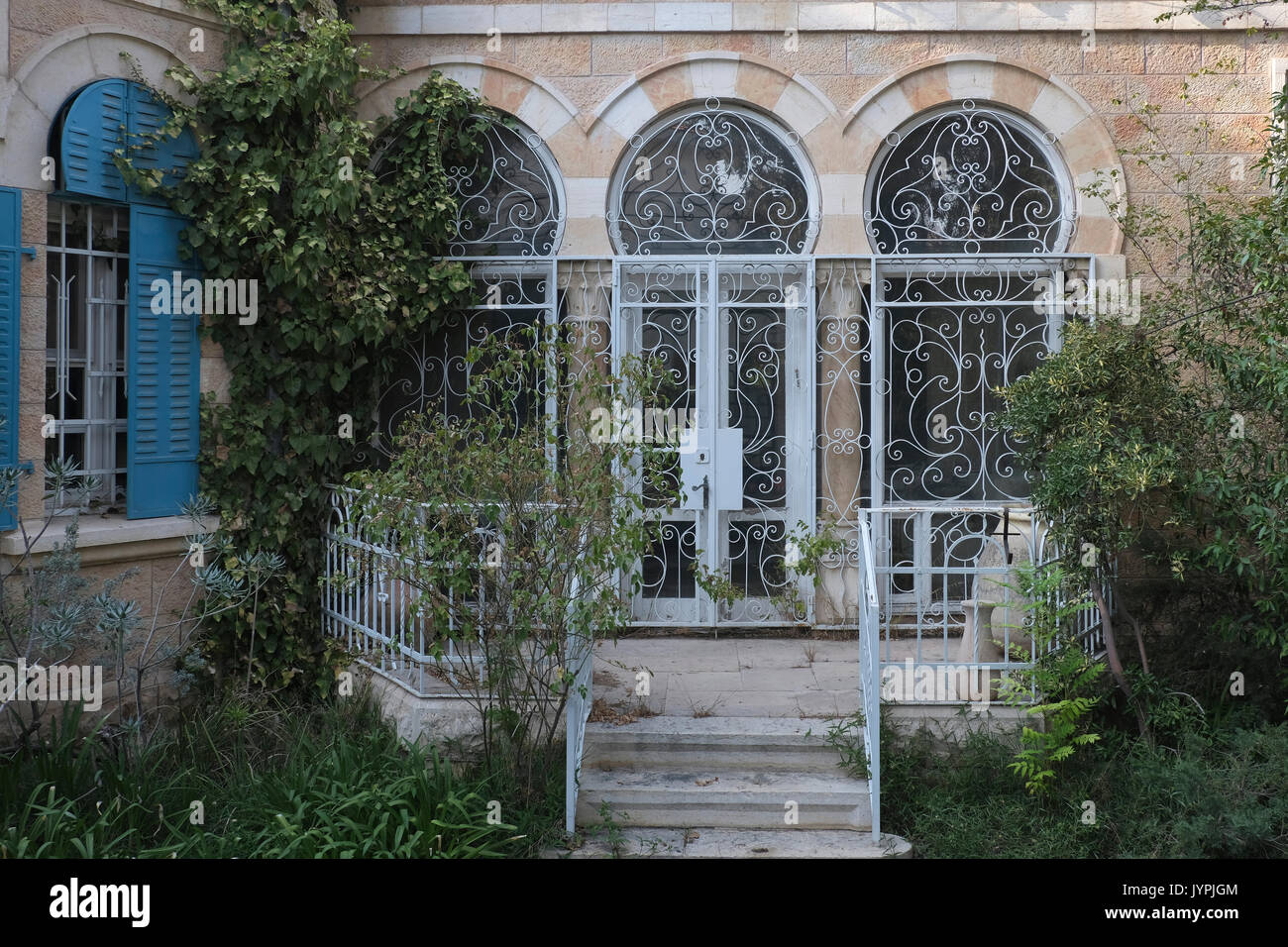 Stylized iron grille at the doorway of the former Arab villa of Barakat ...