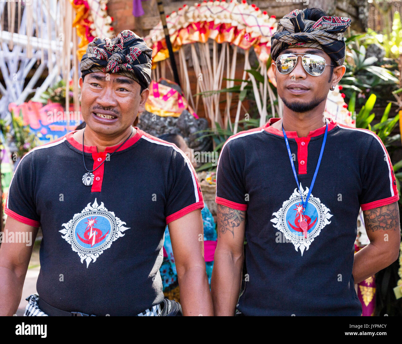 Two Balinese policemen guarding the Royal Palace, Ubud, Bali, Indonesia ...