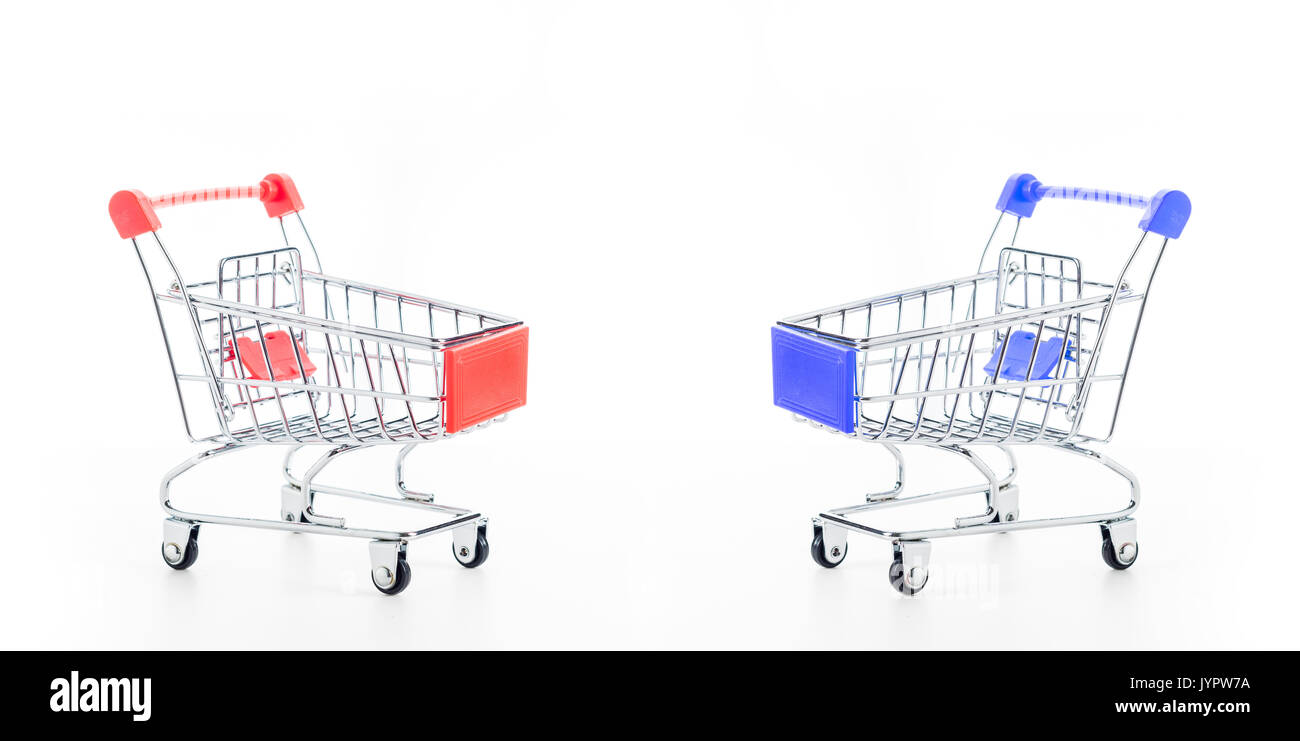 Two Shopping carts on white background Stock Photo - Alamy
