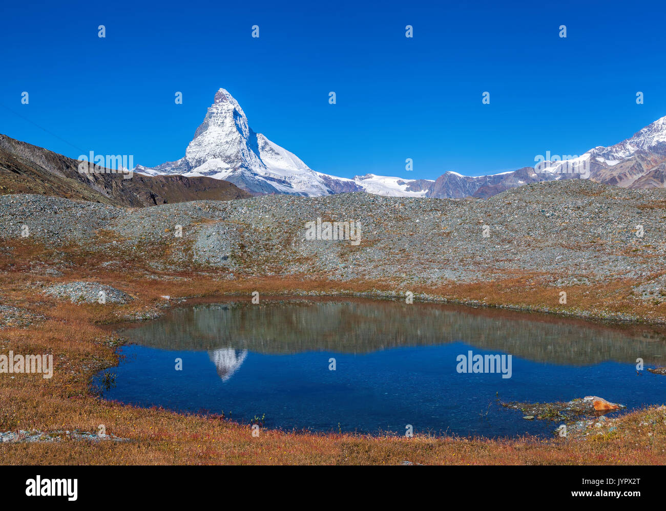 Reflection of the Matterhorn in the lake, Zermatt area, Switzerland ...