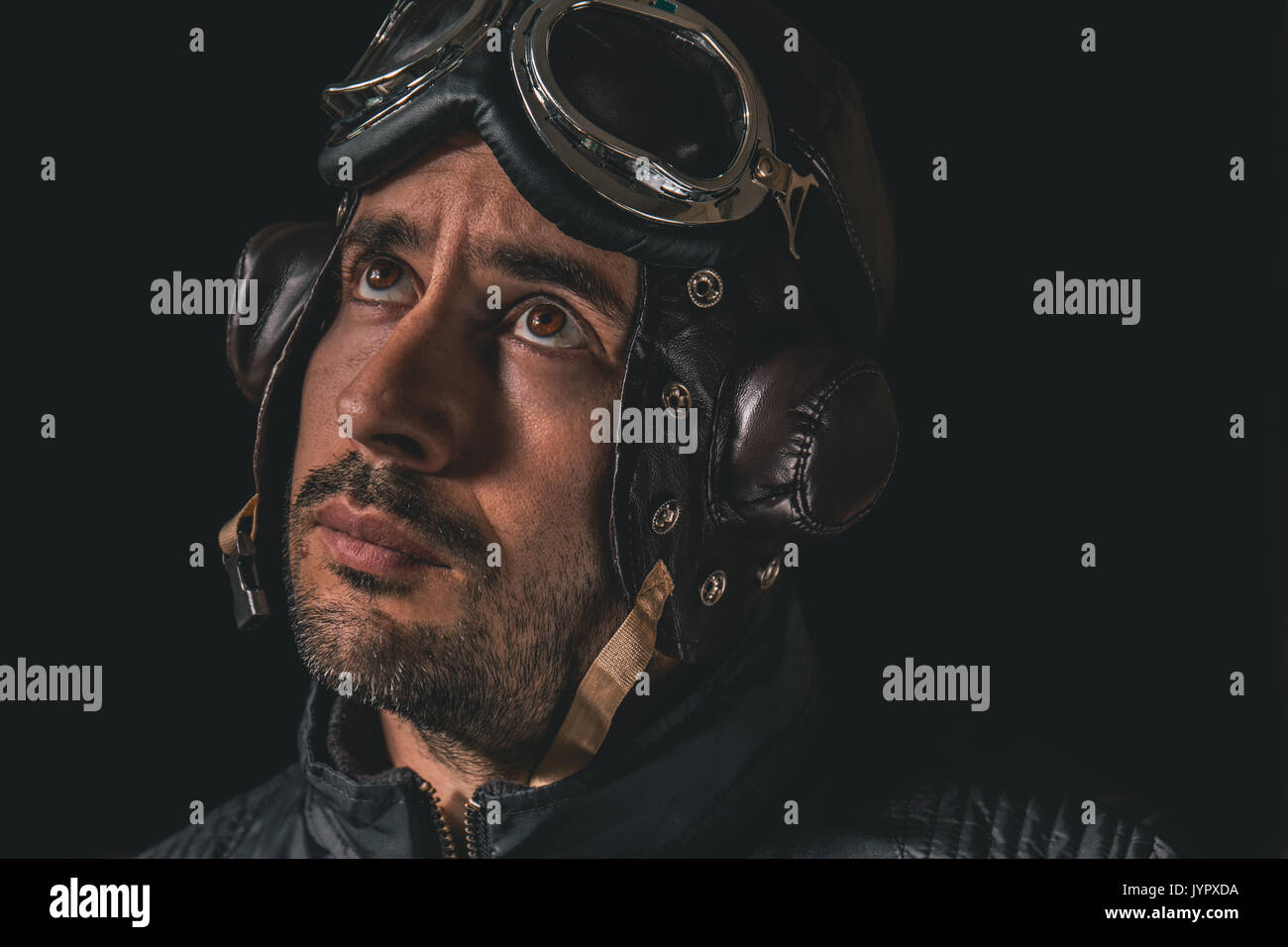 Portrait of a man with aviator helmet and goggles Stock Photo - Alamy