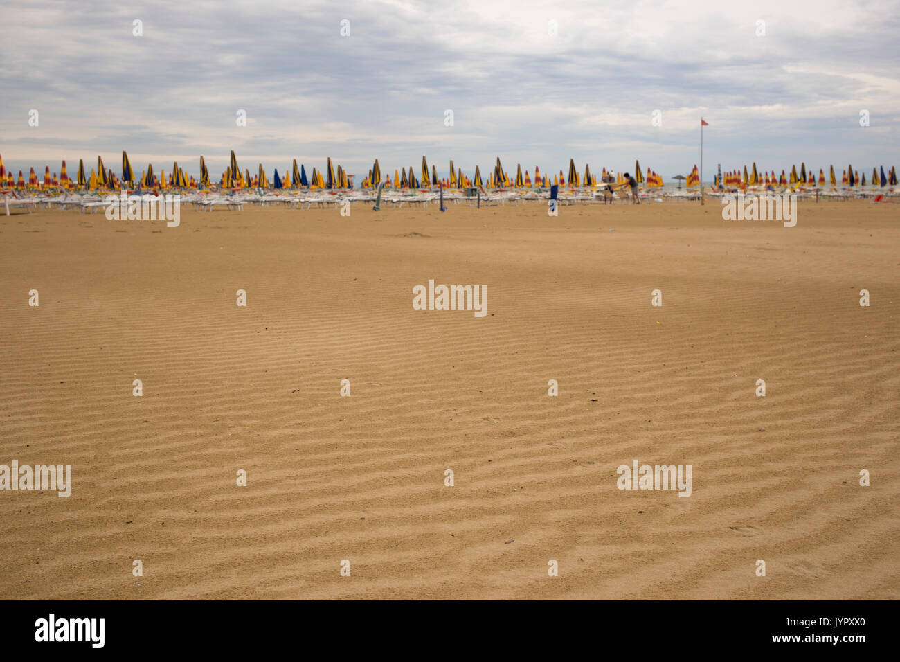 sandy beach in a rainy windy day Stock Photo - Alamy