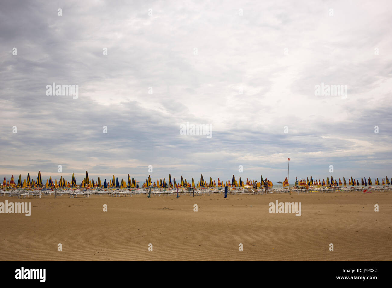 sandy beach in a rainy windy day Stock Photo - Alamy