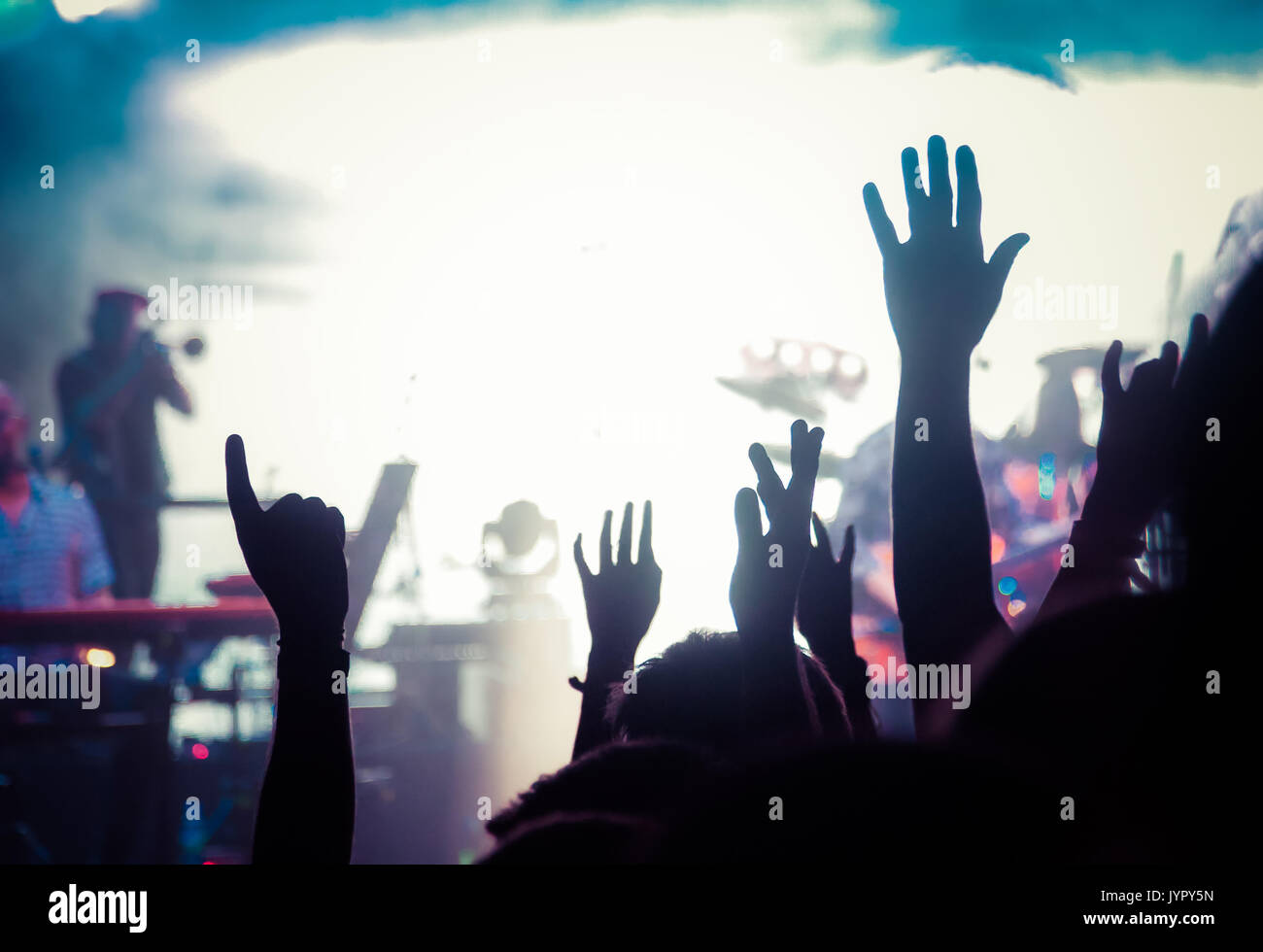 crowd with raised hands at concert - summer music festival Photo ...