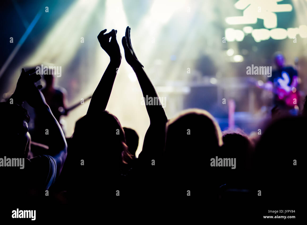 crowd with raised hands at concert - summer music festival Photo ...