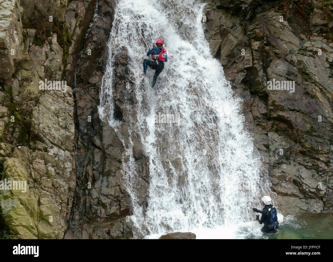 climbing down waterfalls Stock Photo - Alamy