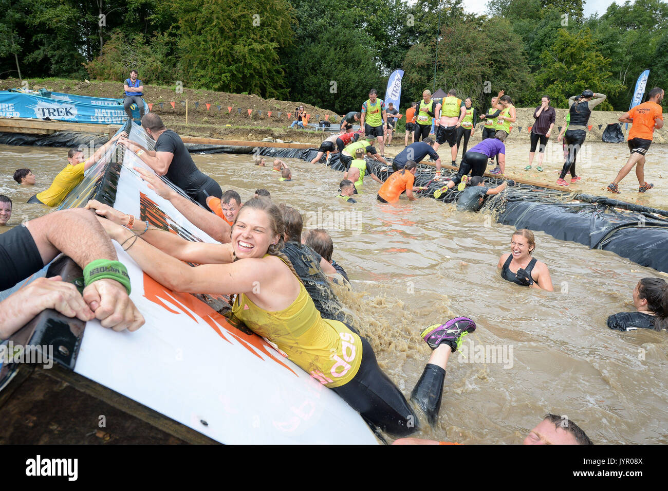 Competitors cling onto rotating blocks on the 'block ness monster ...