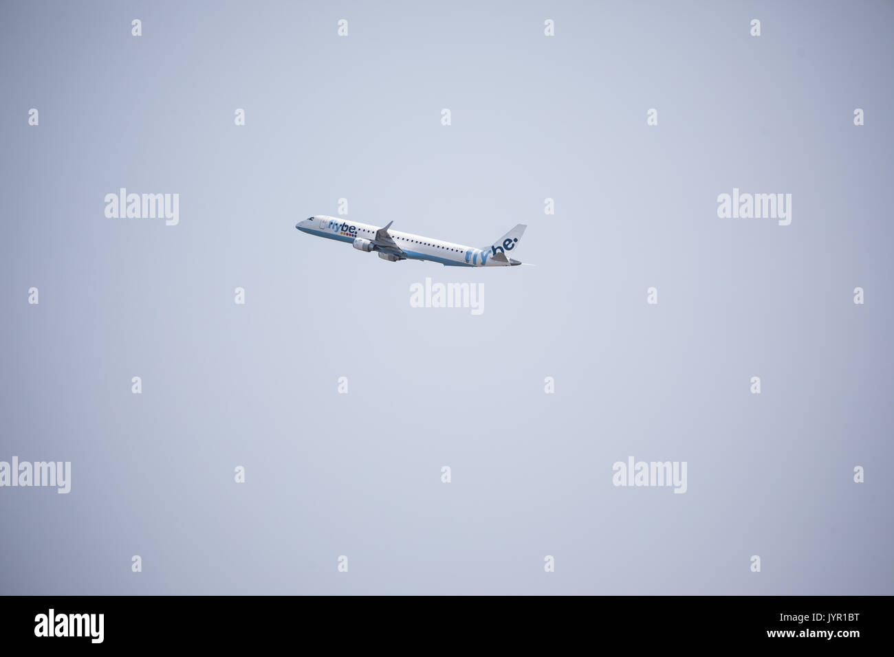 Passenger Aircraft in the blue sky. transport airplane Stock Photo - Alamy