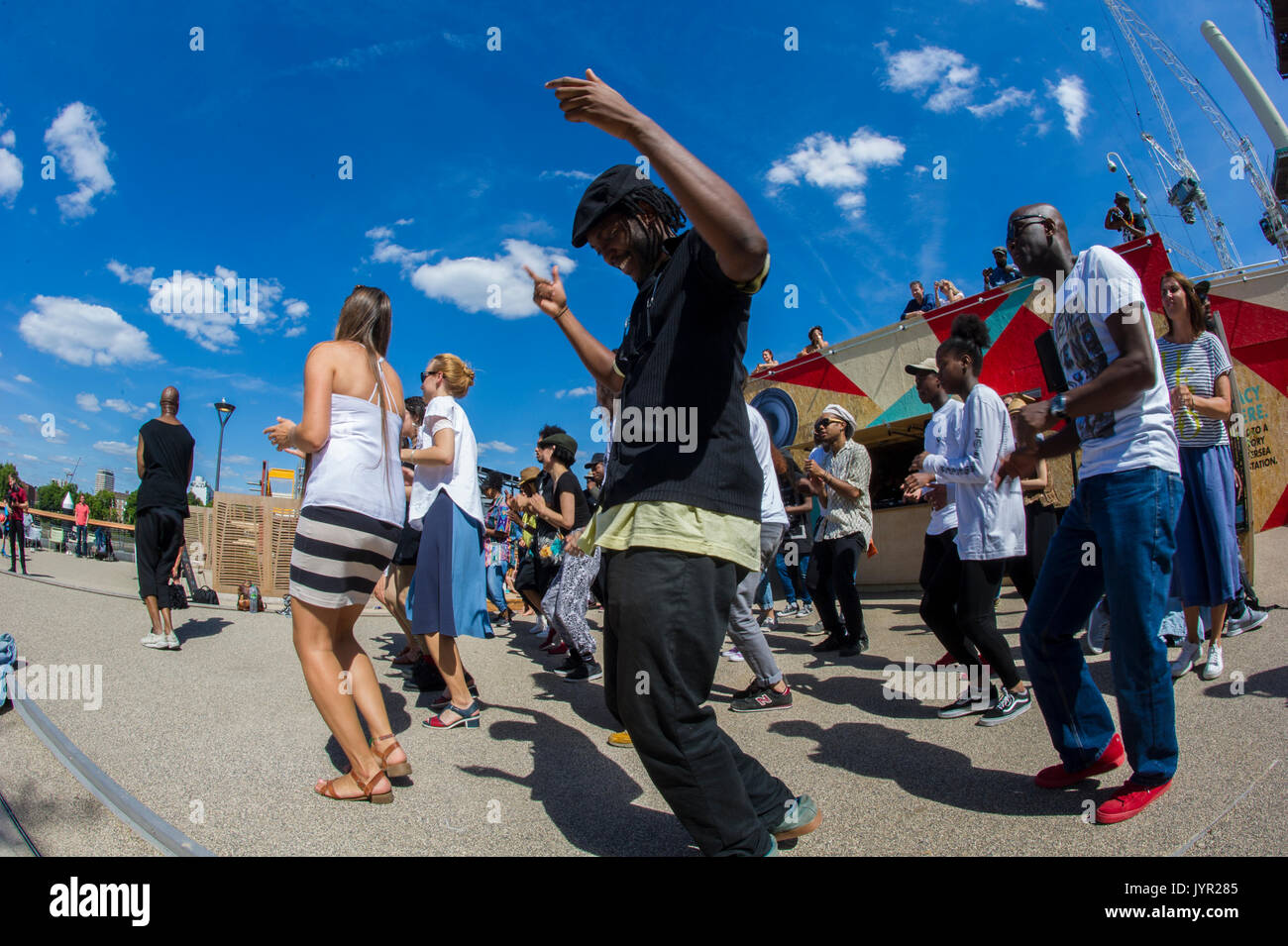 Very cool dancers having fun learning Salsa dancing at the foot of ...