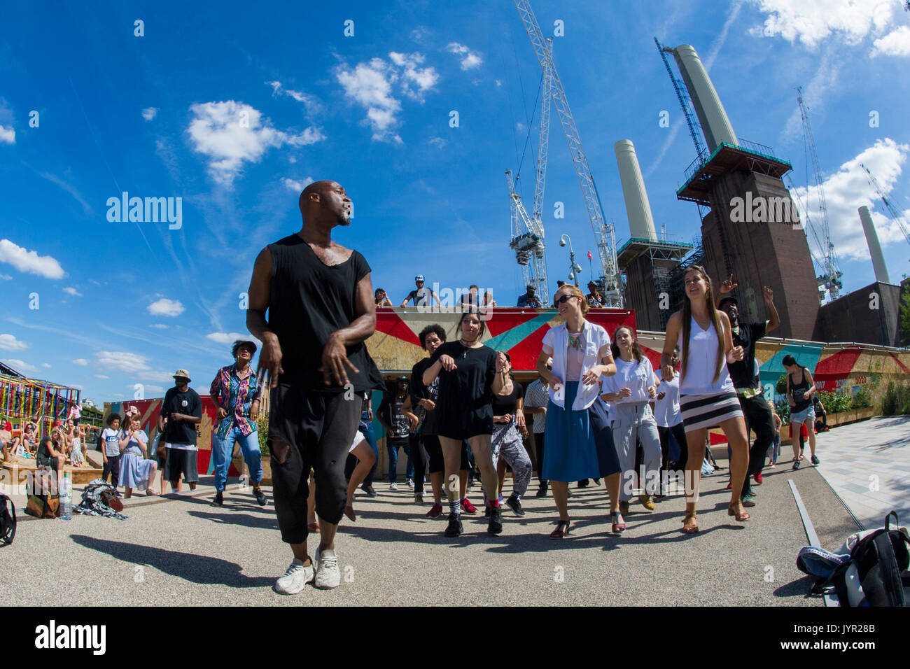 Very cool dancers having fun learning Salsa dancing at the foot of ...