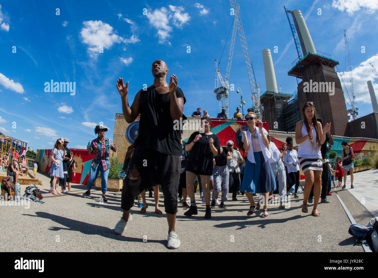 Very cool dancers having fun learning Salsa dancing at the foot of ...