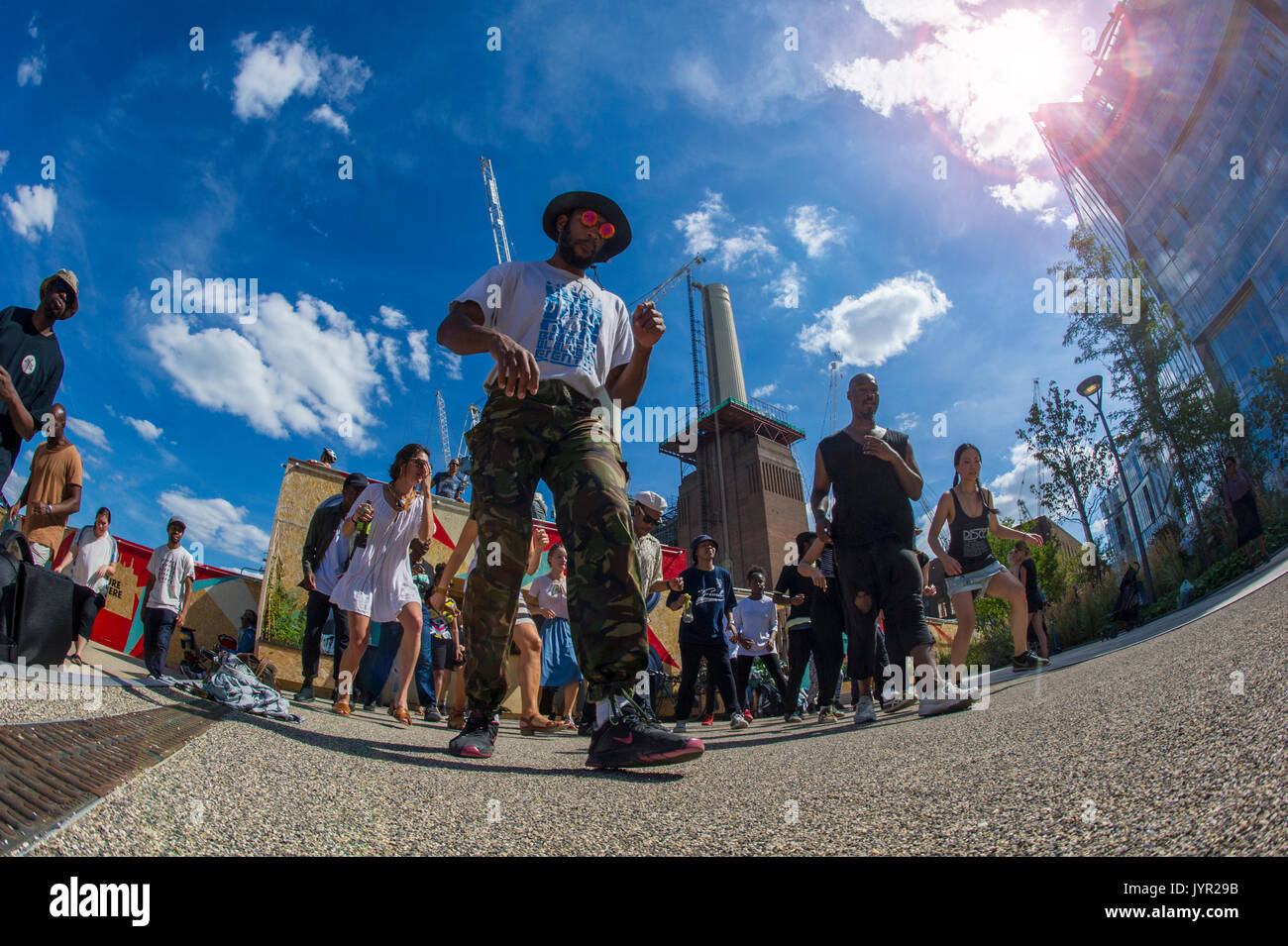 Very cool dancers having fun learning Salsa dancing at the foot of ...