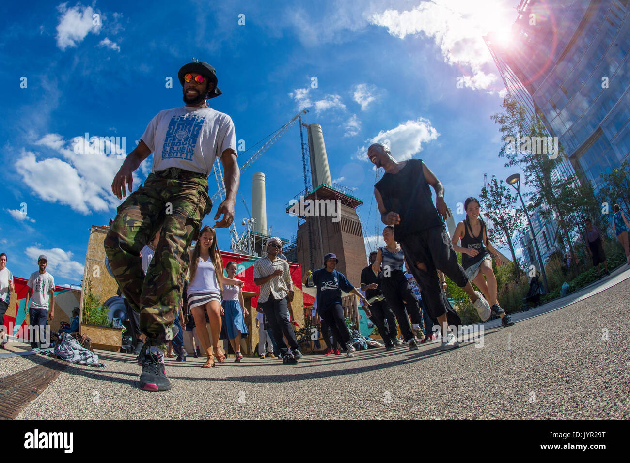 Very cool dancers having fun learning Salsa dancing at the foot of ...