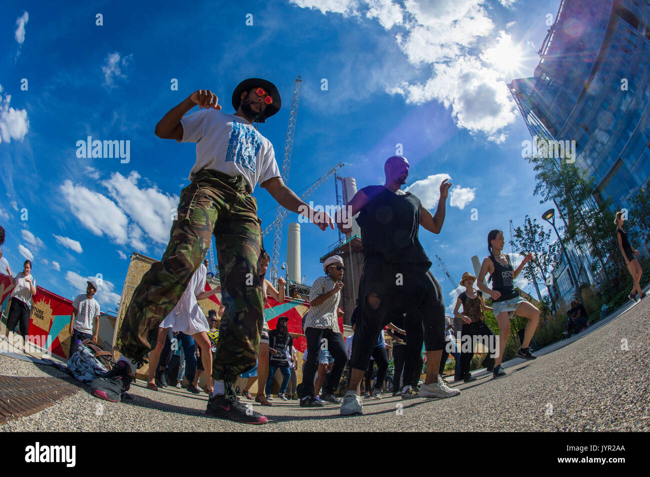 Very cool dancers having fun learning Salsa dancing at the foot of ...