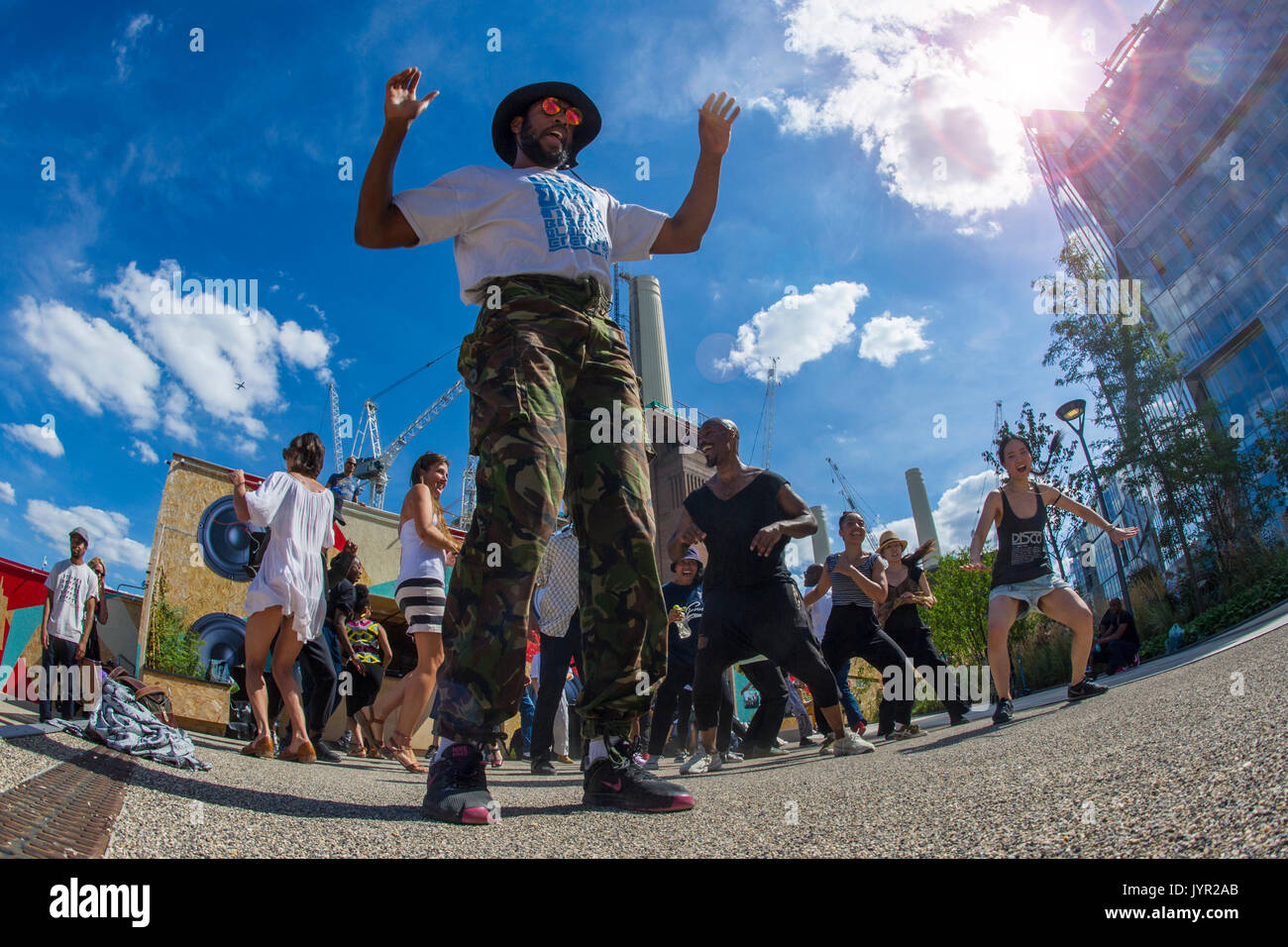Very cool dancers having fun learning Salsa dancing at the foot of ...