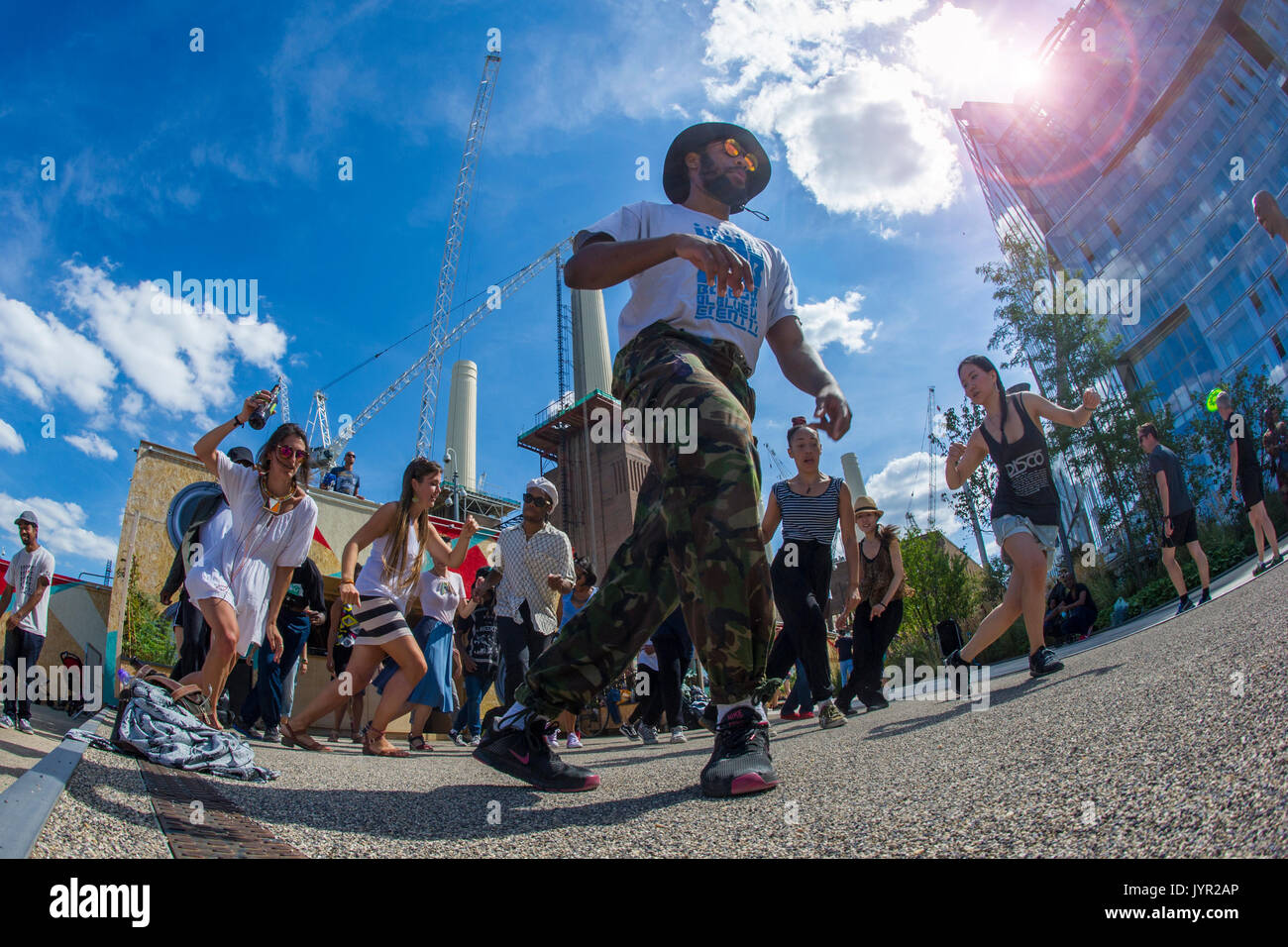 Very cool dancers having fun learning Salsa dancing at the foot of ...