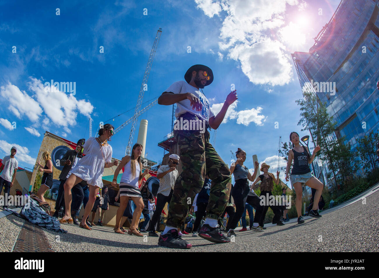 Very cool dancers having fun learning Salsa dancing at the foot of ...