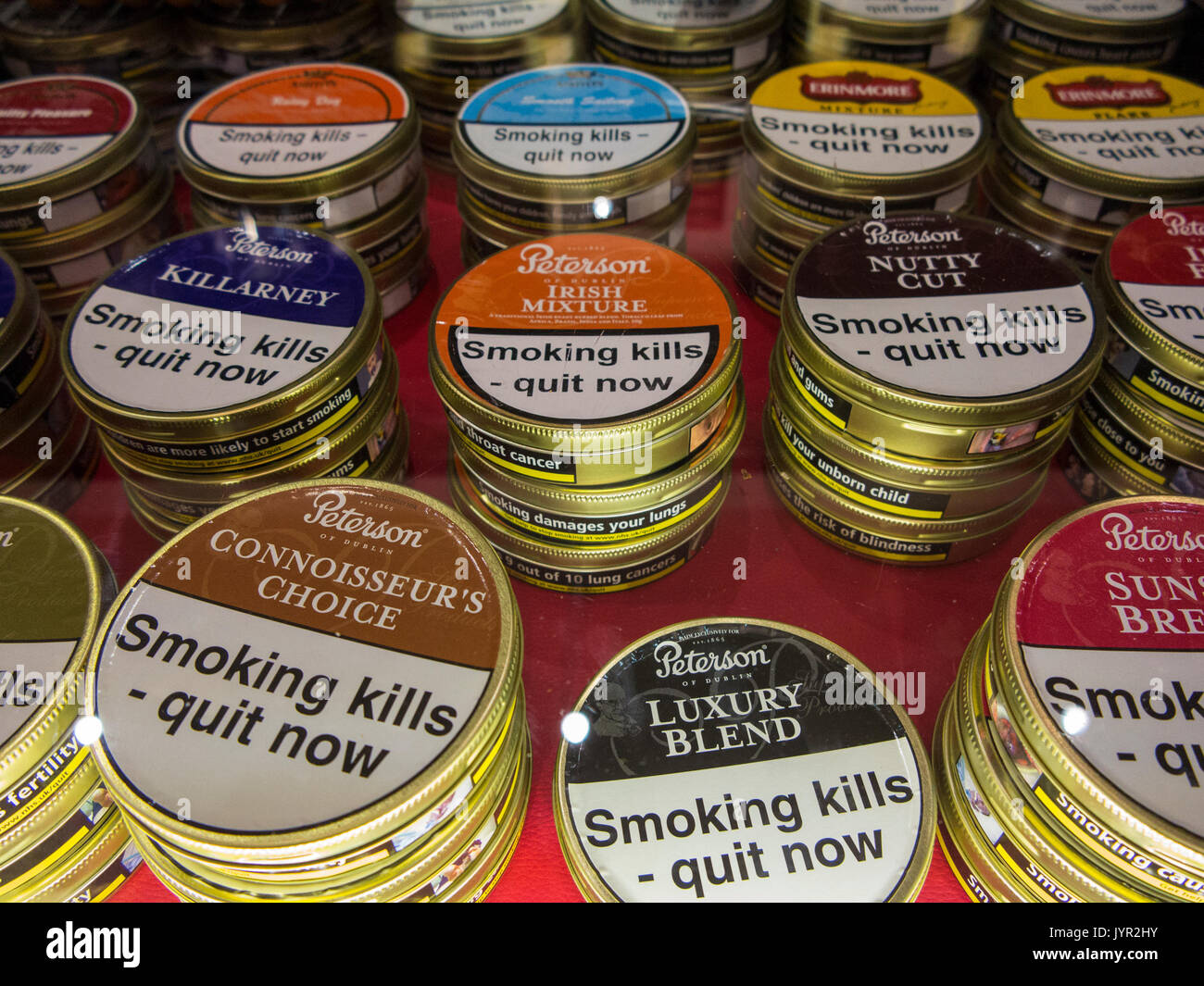 Multiple tins of different flavoured pipe tobacco Stock Photo - Alamy