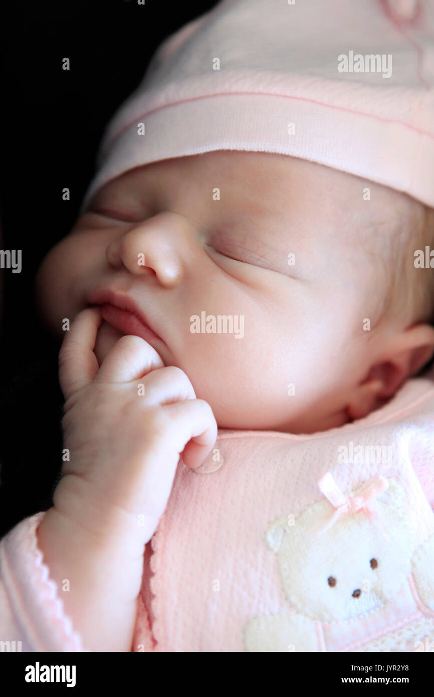 Sleeping newborn baby. The first days of life of the newborn girl Stock ...