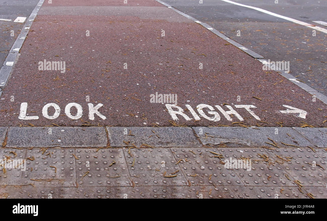 Look right sign on street pavement in London Stock Photo - Alamy