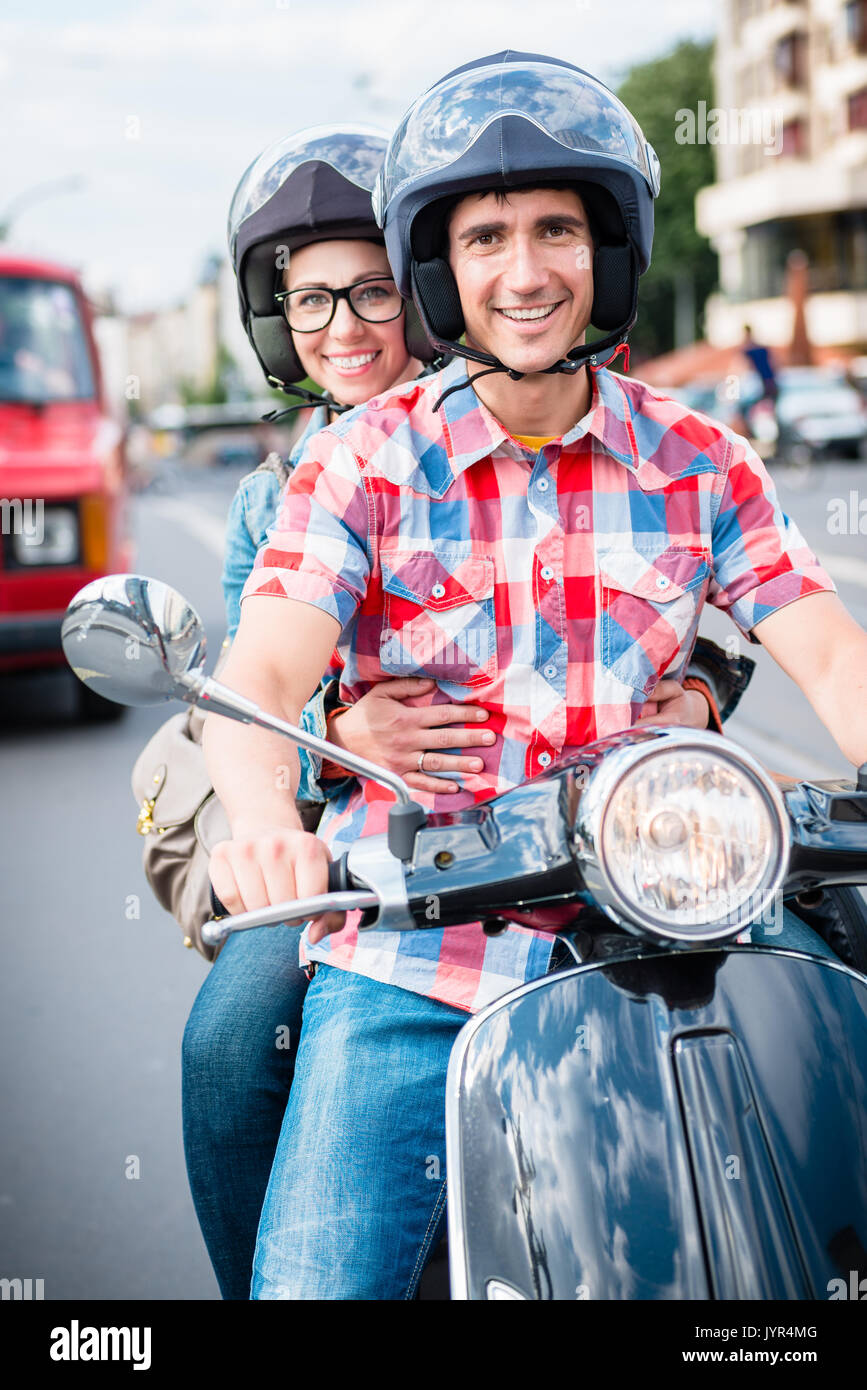 Scooter driver in the streets of Berlin Stock Photo - Alamy