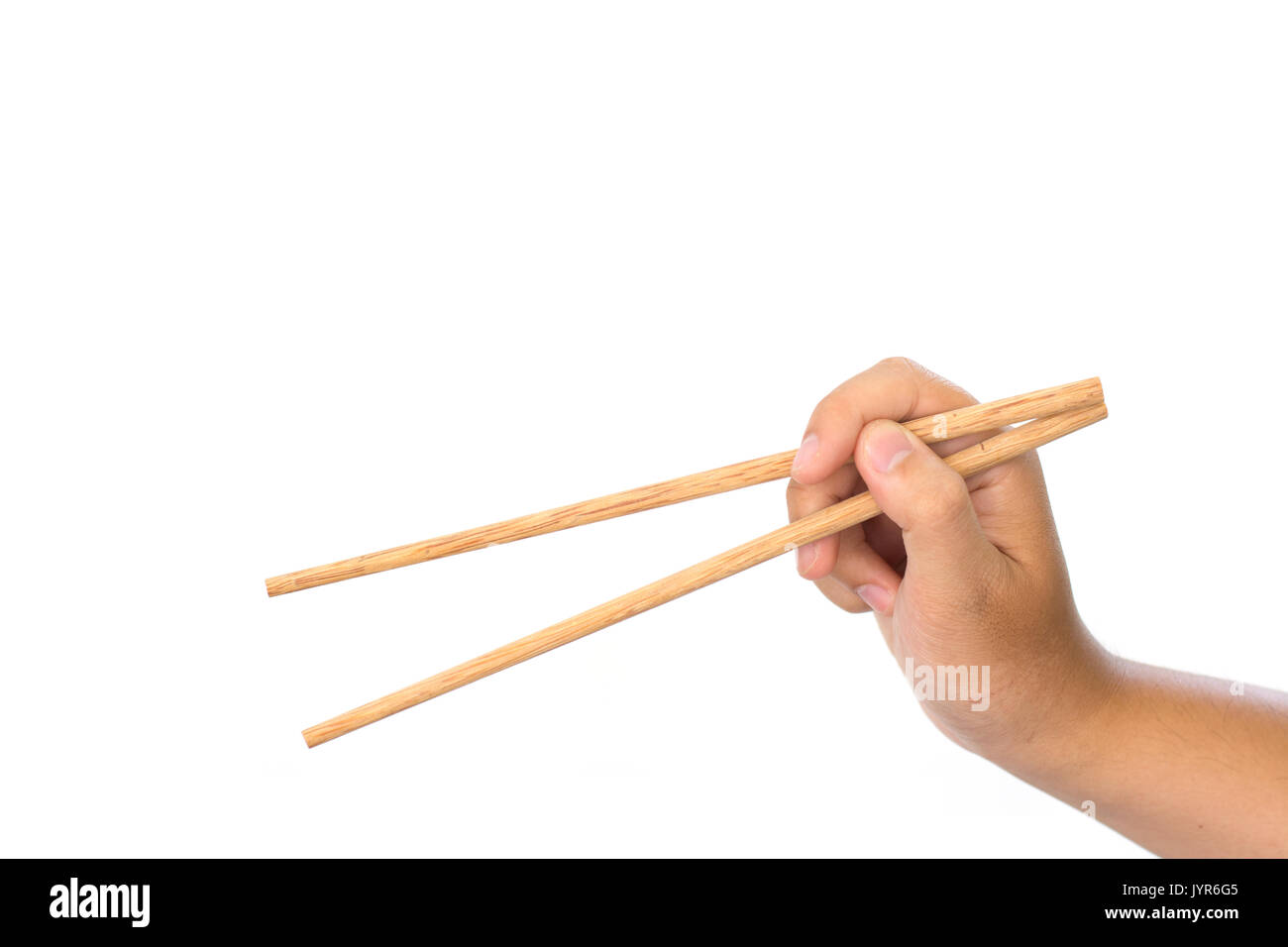 hand holding Wooden chopsticks isolated on white background Stock Photo ...