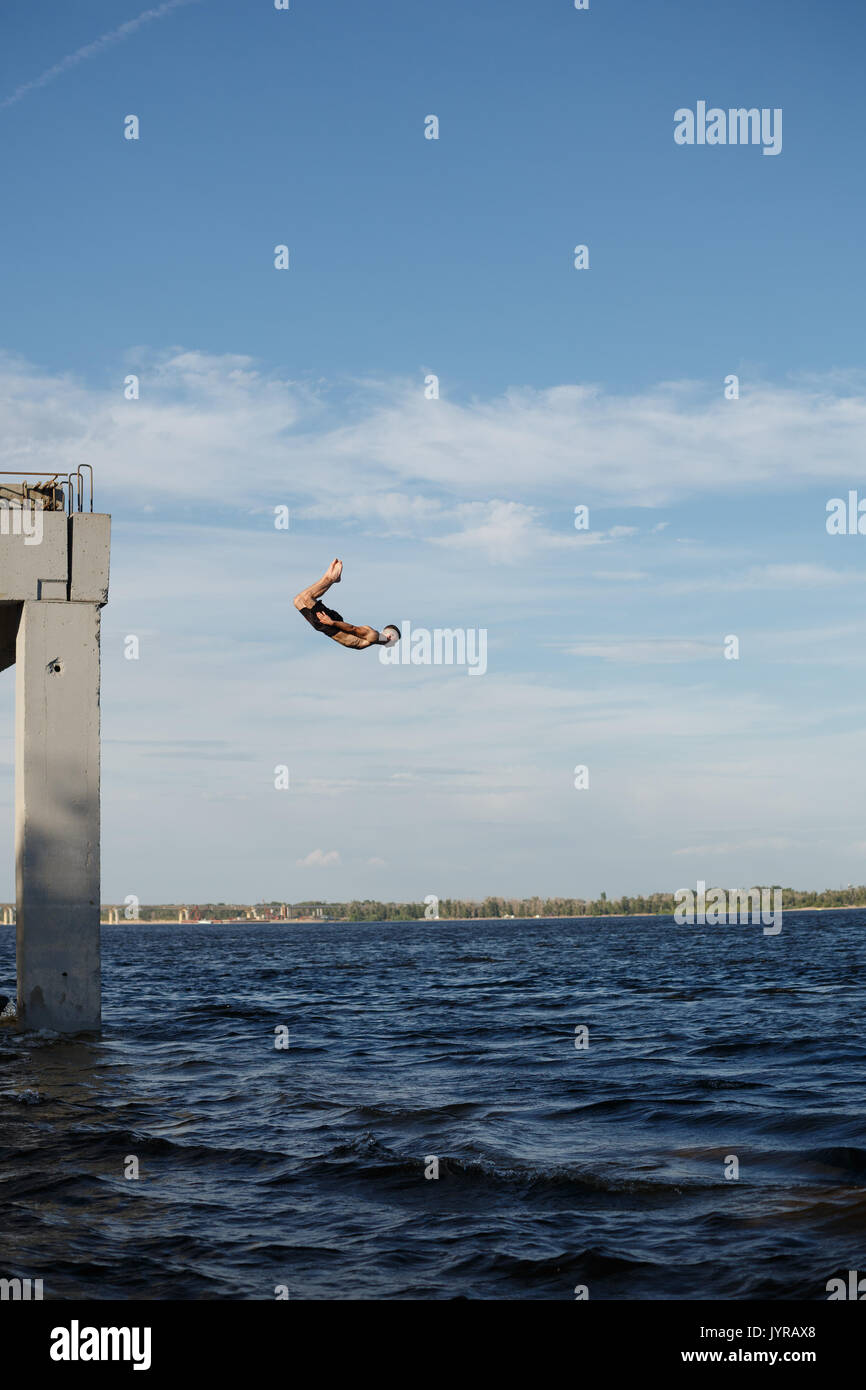 Young swimmer jumps hi-res stock photography and images - Alamy