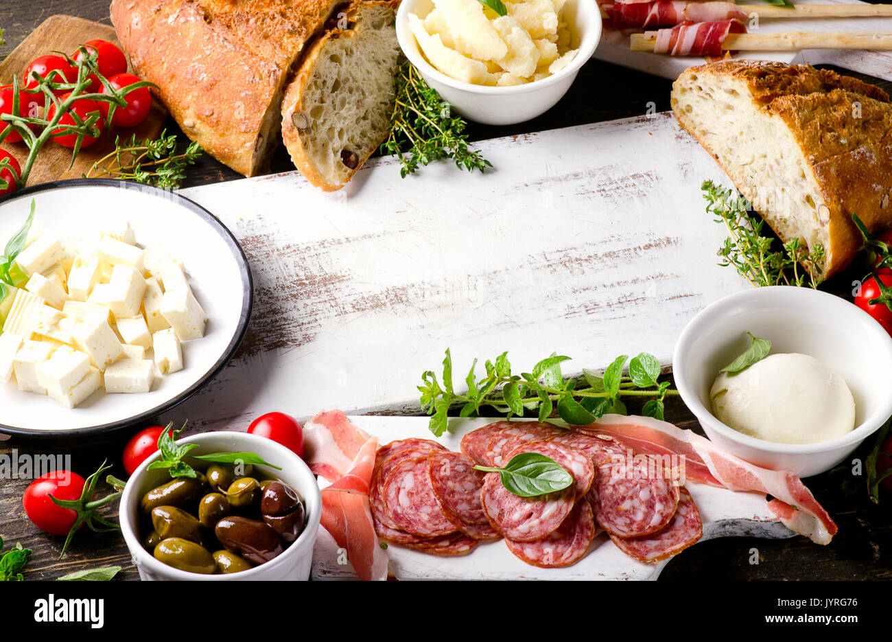 Various types of italian food on wooden table. View fom above Stock ...