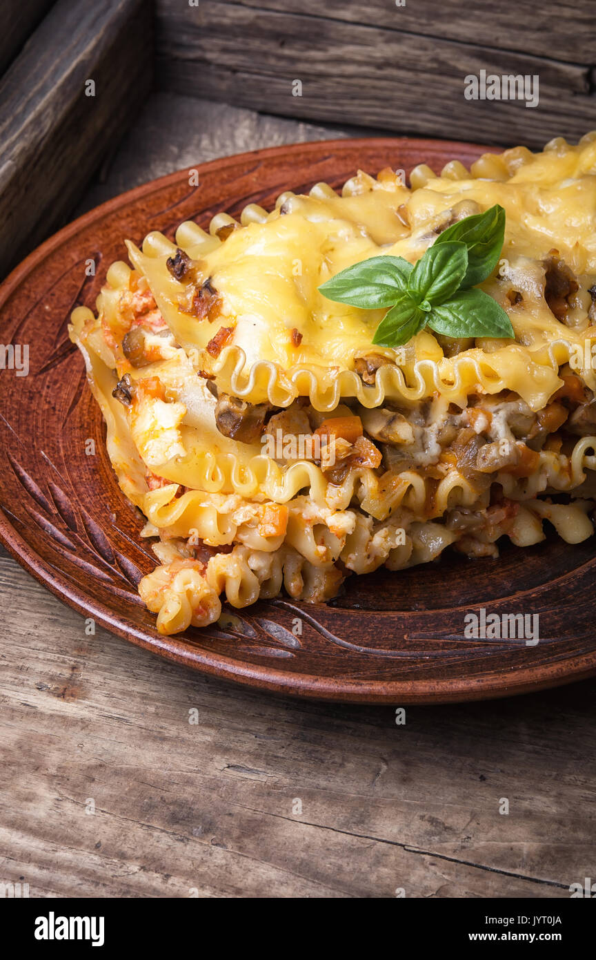 Traditional Classic italian lasagna on wooden rustic background Stock ...