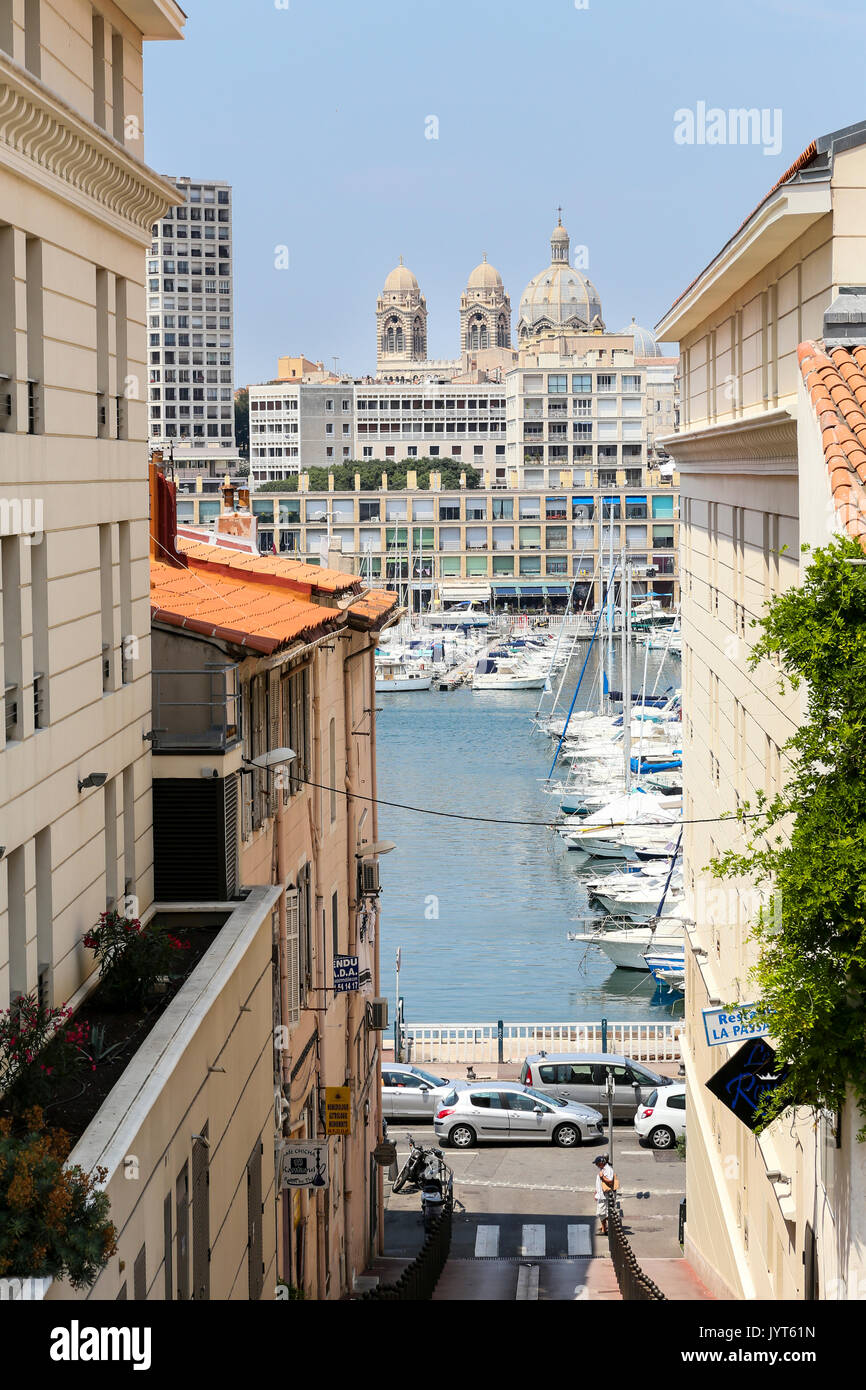 View down inner city street to marina in Marseilles, Provence, France ...