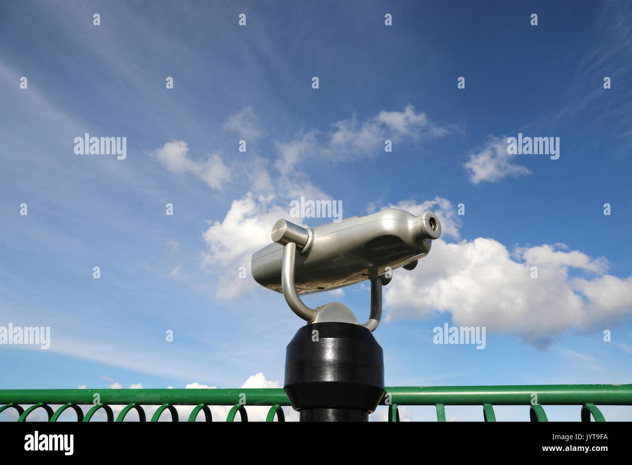 Coin-operated spy viewing machine against cloudy sky Stock Photo - Alamy