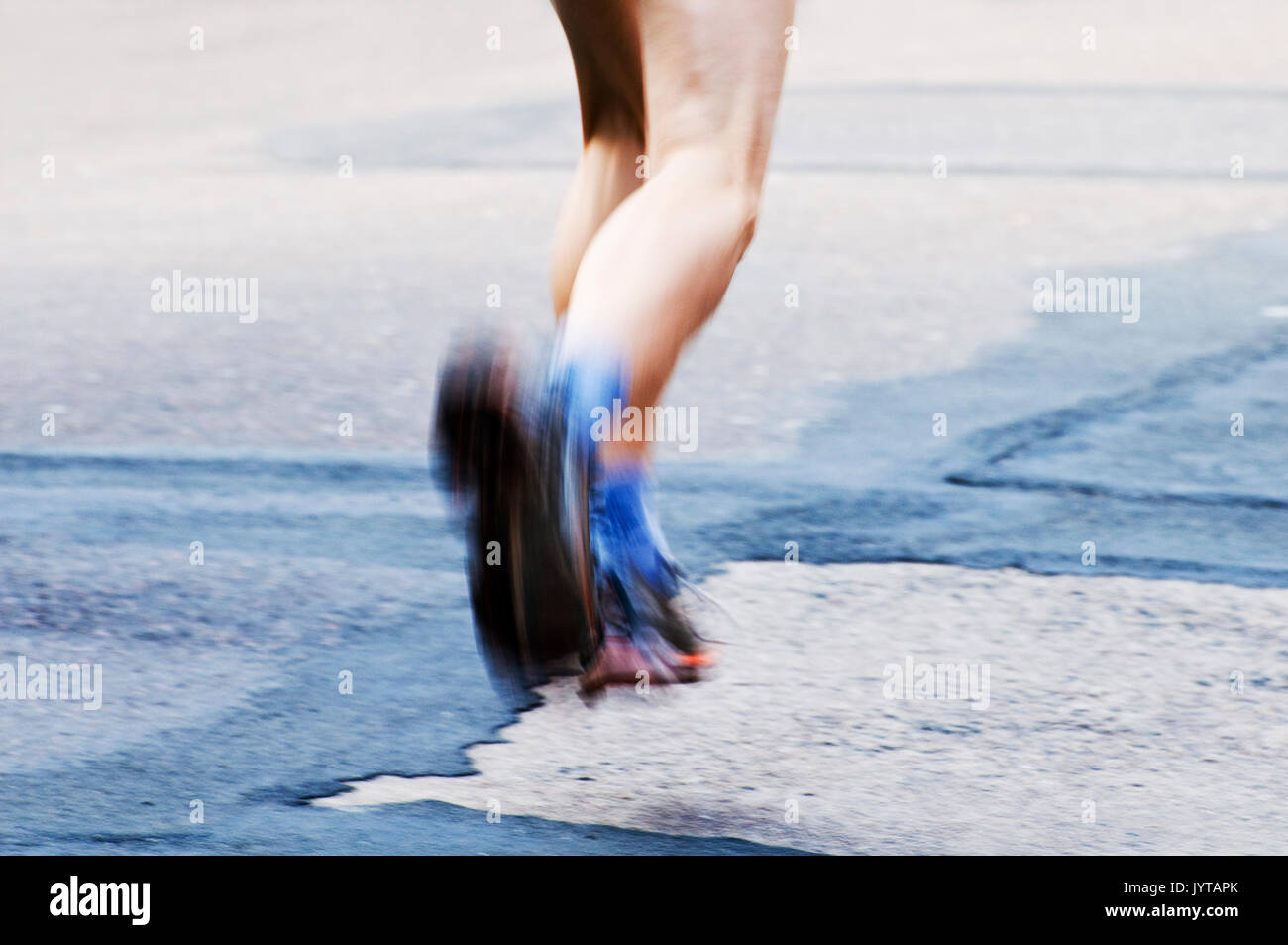 legs of a marathon runner Stock Photo - Alamy
