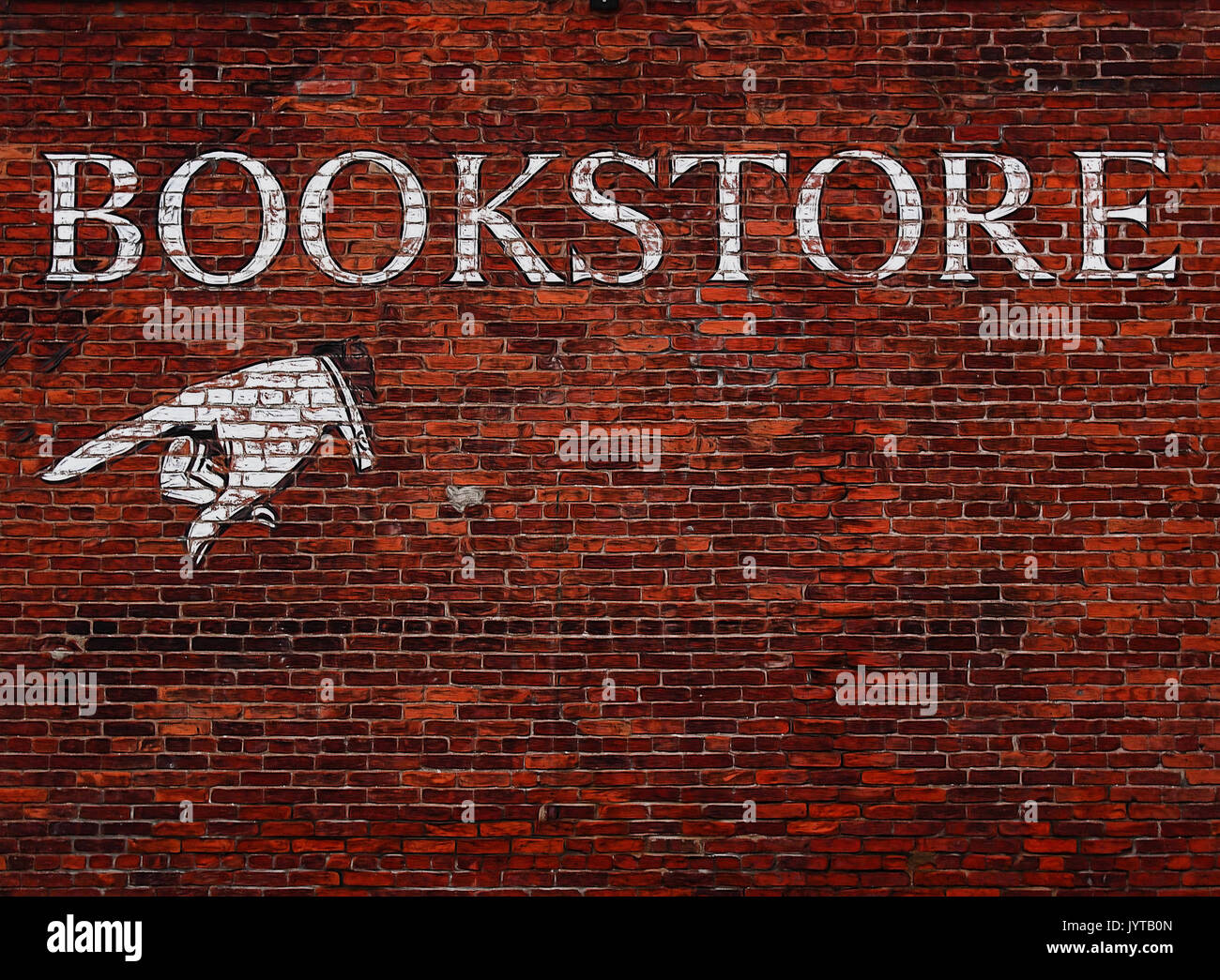 sign for a bookstore on a brick exterior wall Stock Photo - Alamy