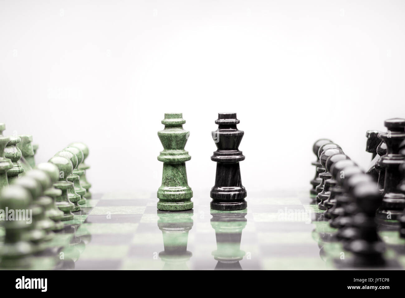 A composition of two kings between the raws of chess pieces Stock Photo ...