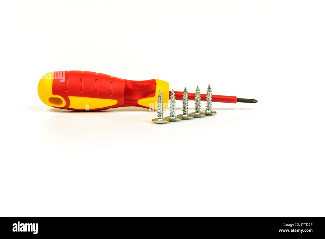 On a light background is a screwdriver with a cross-shaped tip and self ...