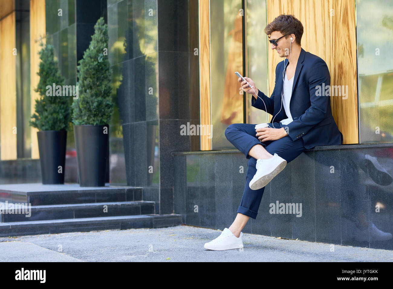 Suit trendy hi-res stock photography and images - Alamy