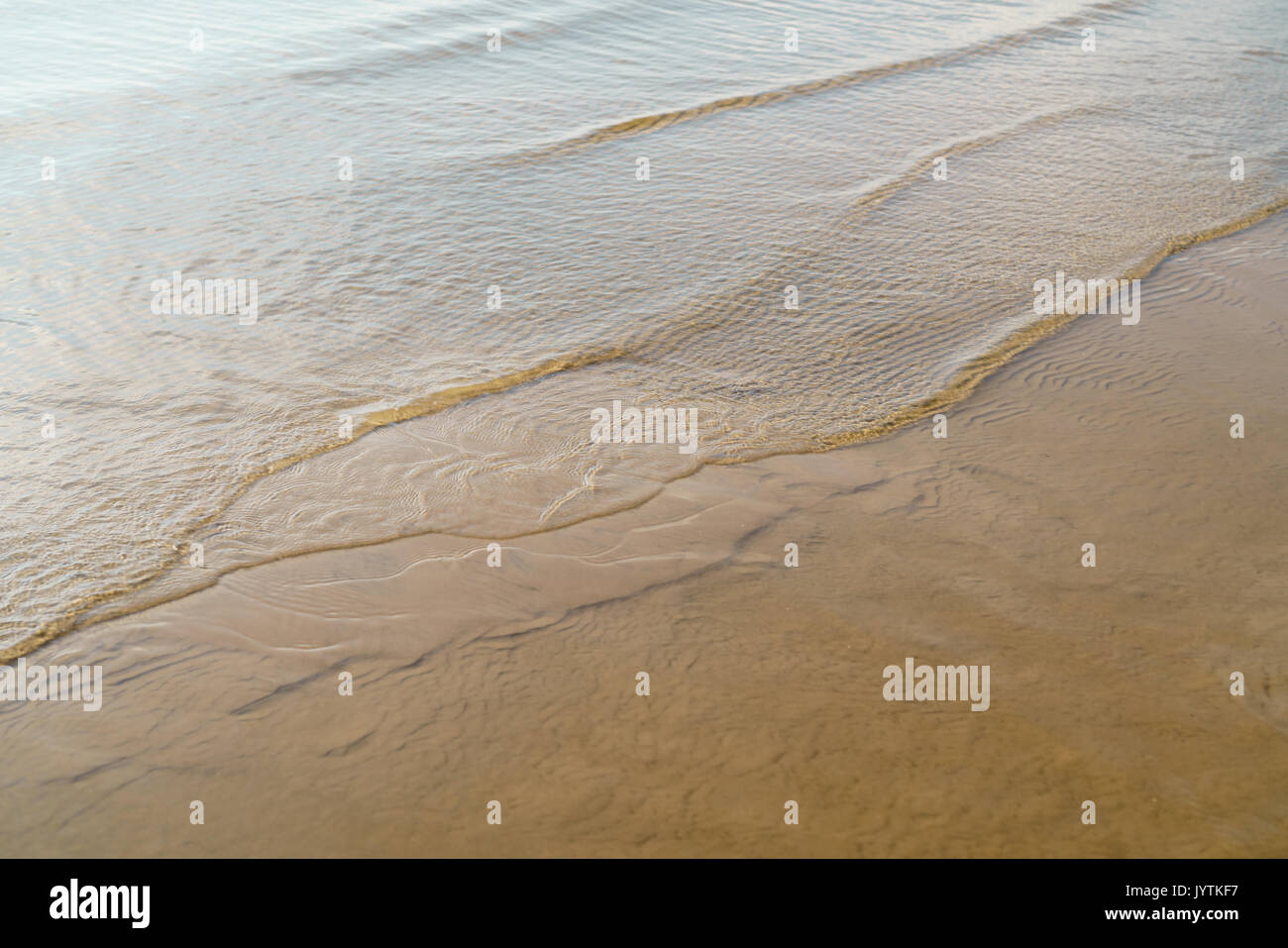 Wave on sandy beach baltic hi-res stock photography and images - Alamy