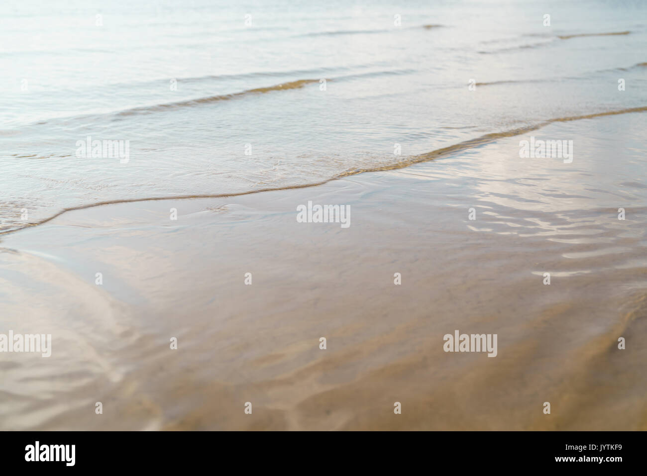 Wave on sandy beach baltic hi-res stock photography and images - Alamy