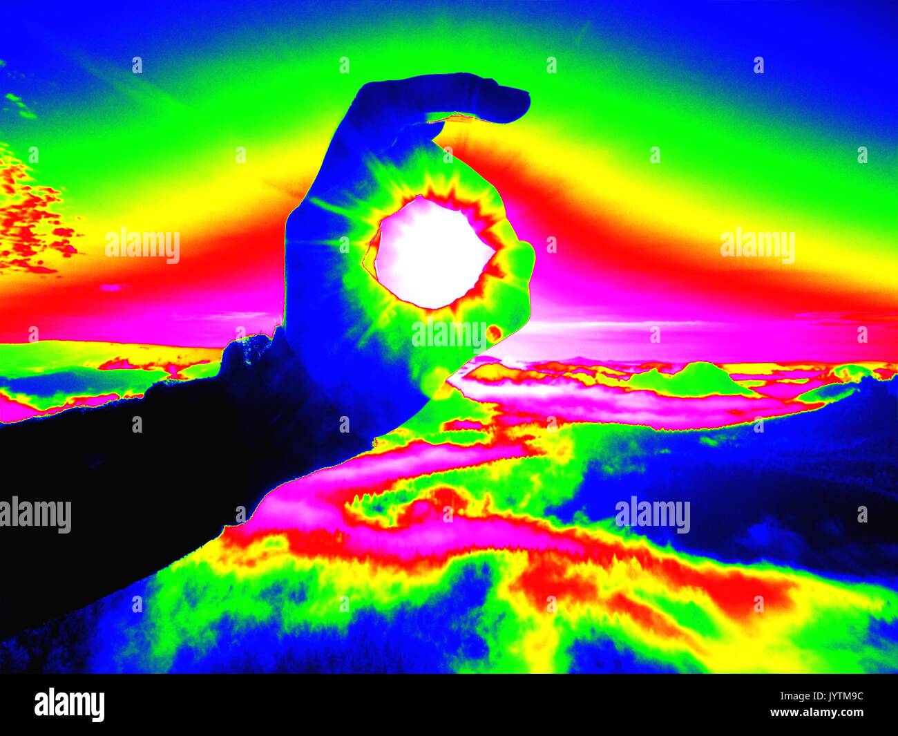Infra scan, thermography photo.Man hand touch to Sun. Circle symbol ...