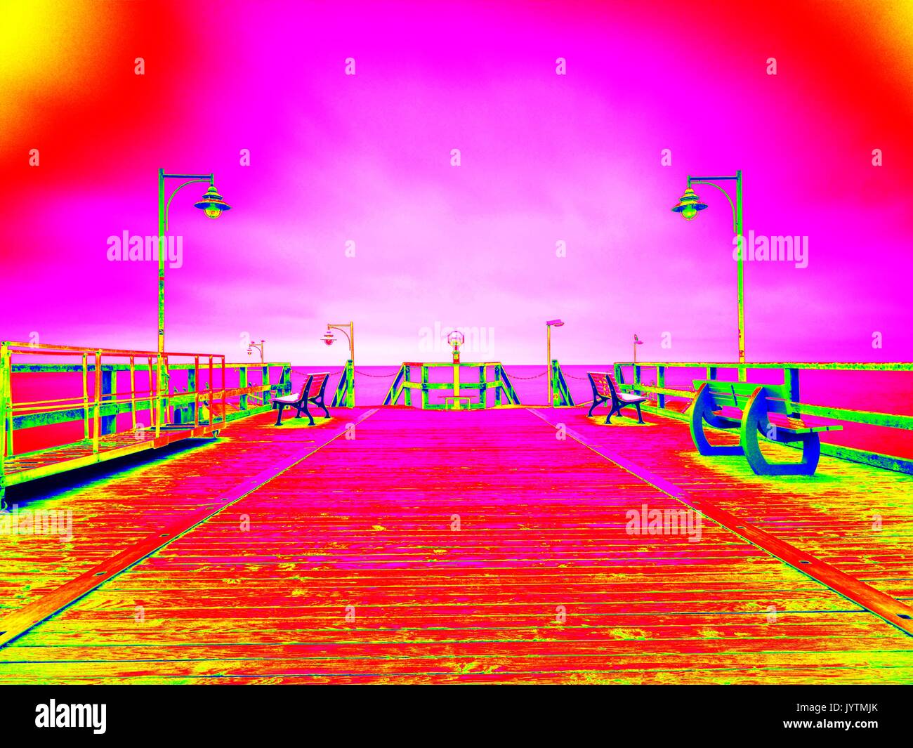 Ultraviolet scan. Infrared photo. Empty wooden mole on blue sea. wharf ...