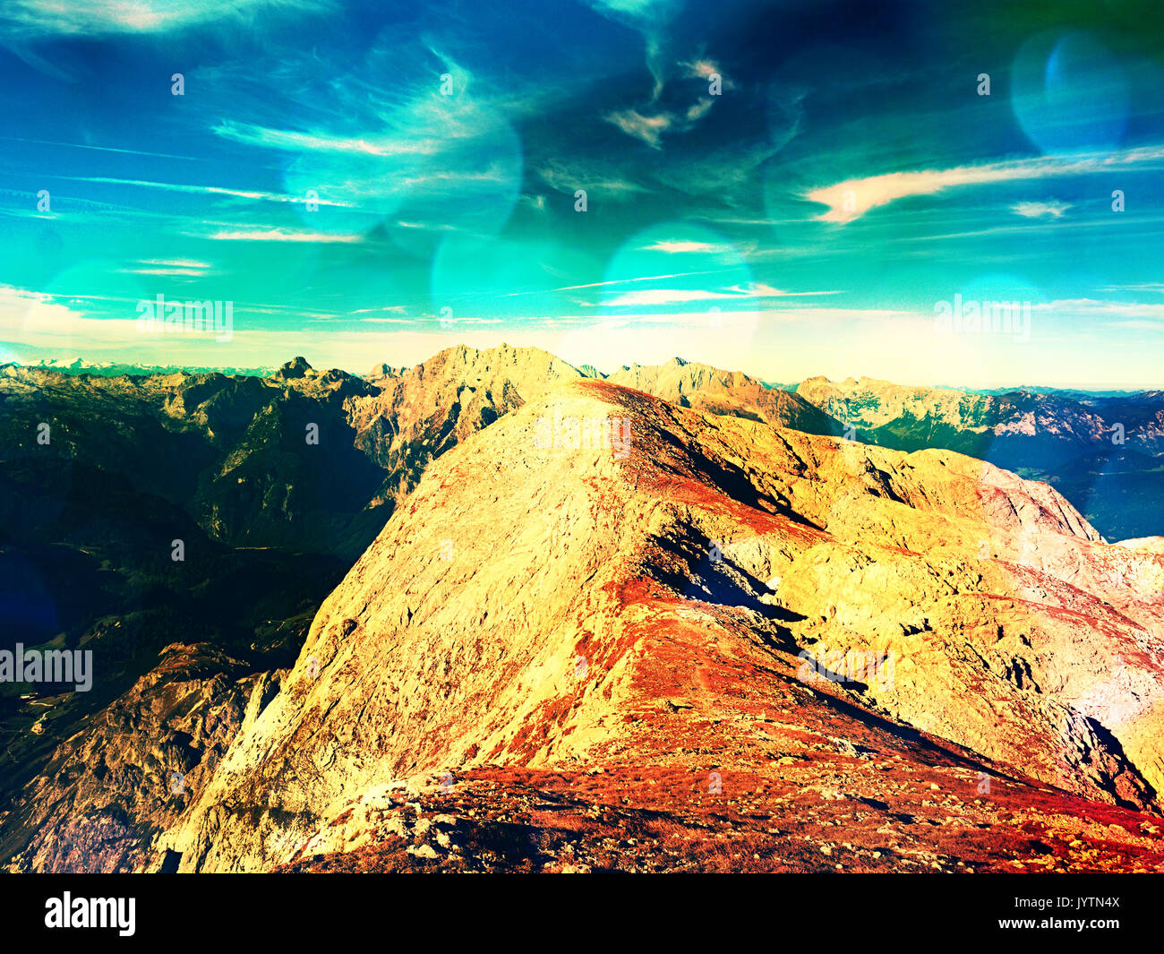 Film grain effect. Film scratch. View over high sharp mountain peaks ...