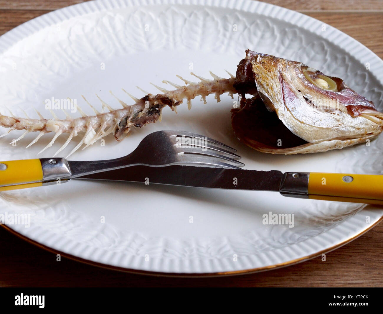 Fishbone in beautiful plate hi-res stock photography and images - Alamy