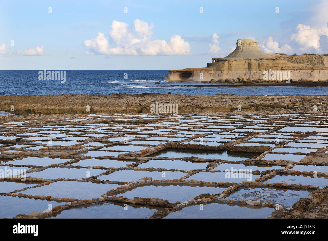 Salt evaporation ponds off the coast of Gozo Stock Photo - Alamy