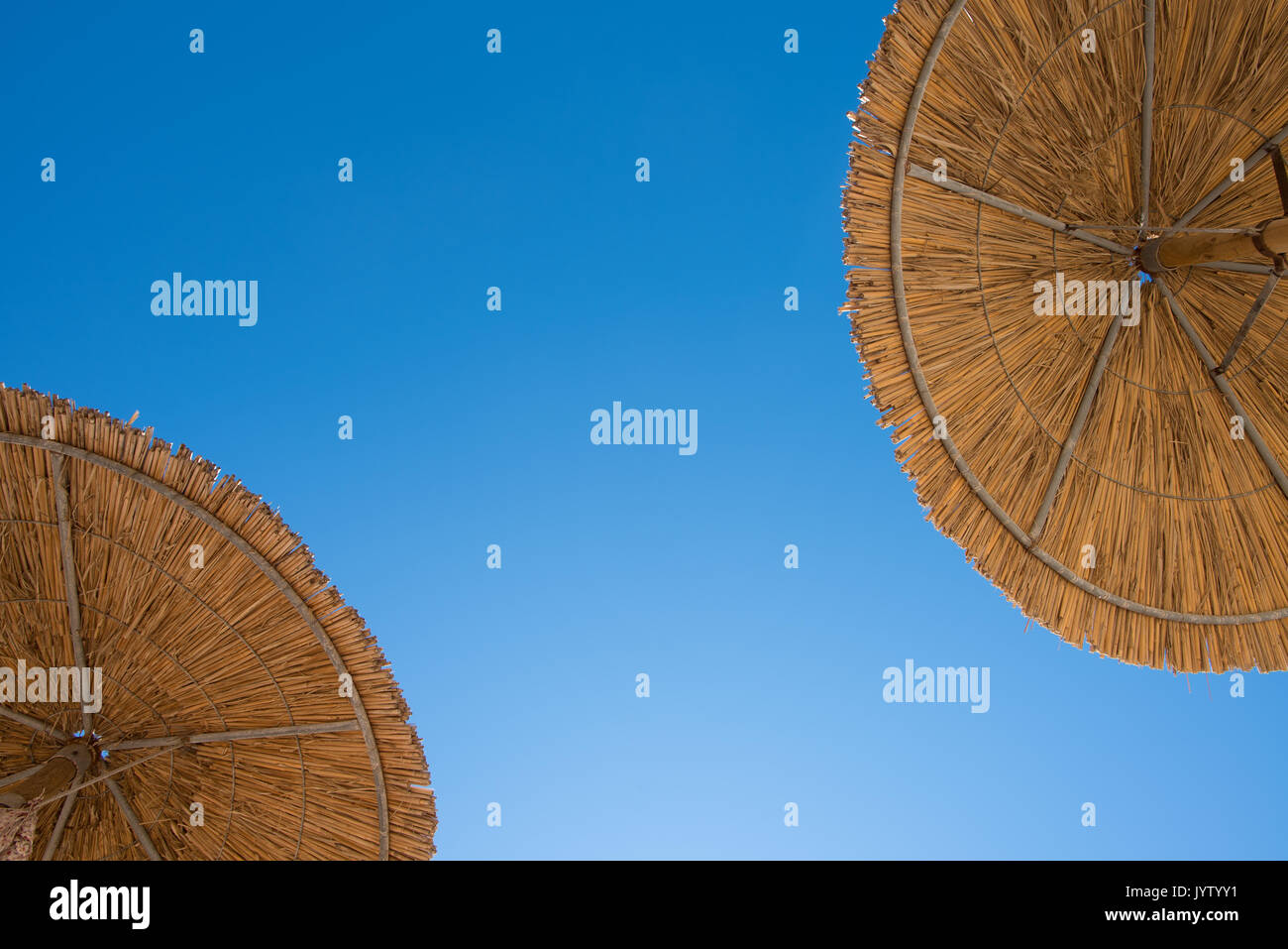 Beach umbrella made straw High Resolution Stock Photography and Images ...