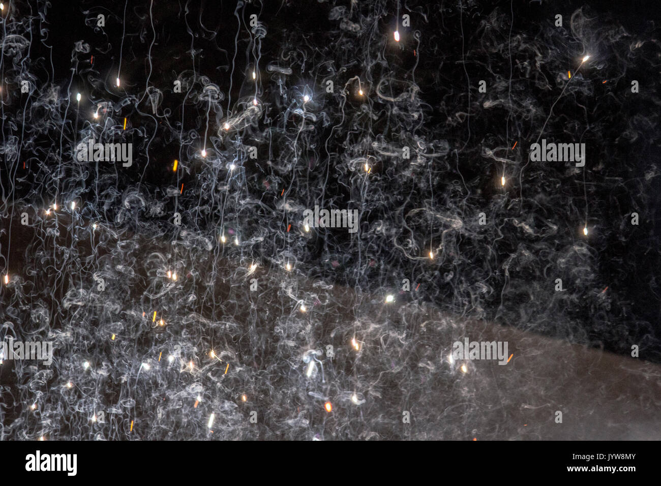 smoky patterns in the dark night Stock Photo - Alamy